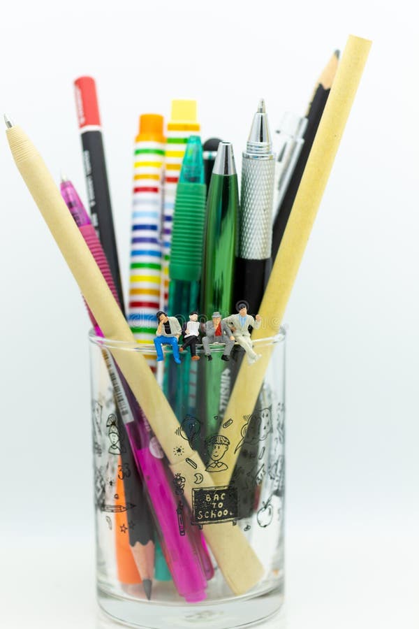 Miniature People Sitting with Tools for Learning. Image Use for ...