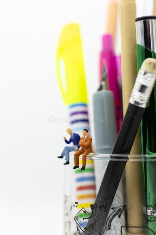 Miniature People Sitting with Tools for Learning. Image Use for ...