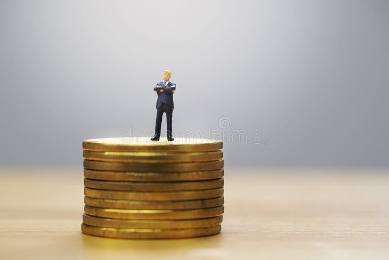 Miniature People on Stack Gold Coin Stock Image - Image of organization ...
