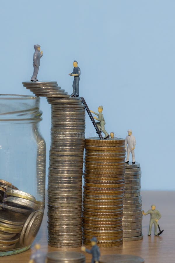 Miniature People Standing on Coins.and Work on Coins Stock Photo ...