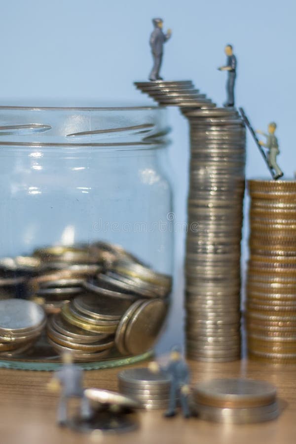 Miniature People Standing on Coins.and Work on Coins Stock Photo ...