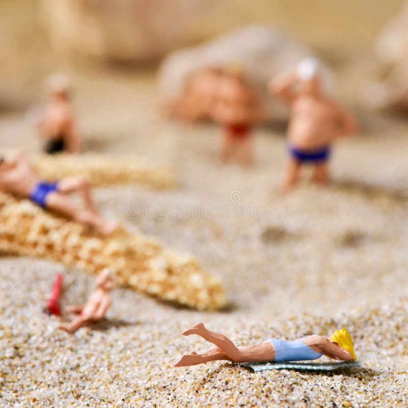 Miniature People in Swimsuit on the Beach Stock Photo - Image of sand ...