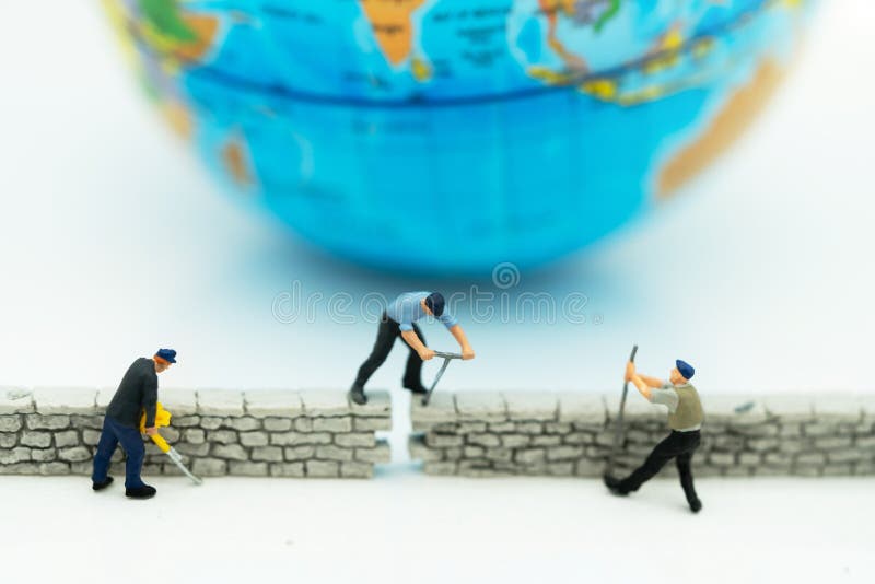 Miniature People: Worker Fix the Wall before the World. Concepts of ...