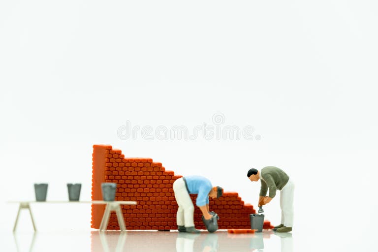 Miniature People: Worker Fix the Wall before the World. Concepts of ...