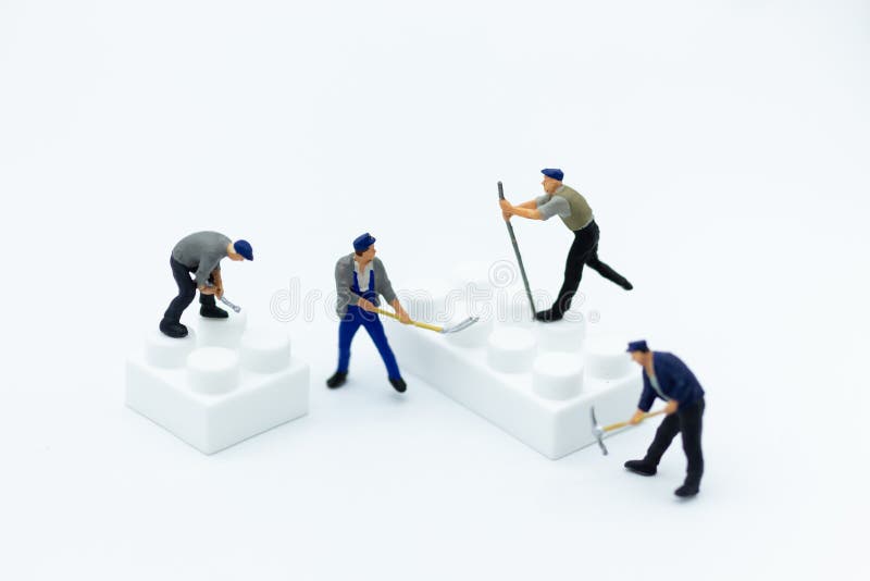 Miniature People: Workers are Using Tools for Drilling Plastic Parts ...