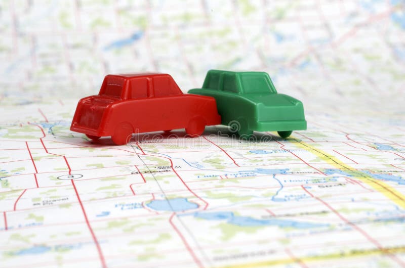 Miniature Plastic Cars on a Map Stock Photo - Image of intersecting ...