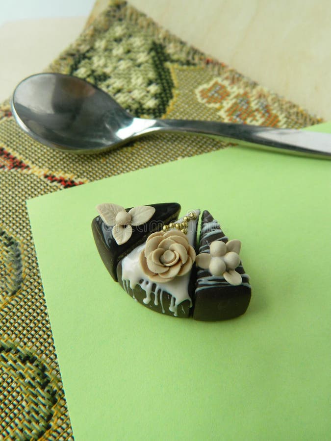 Miniature Polymer Clay Chocolate Cake on the Table Stock Photo - Image ...