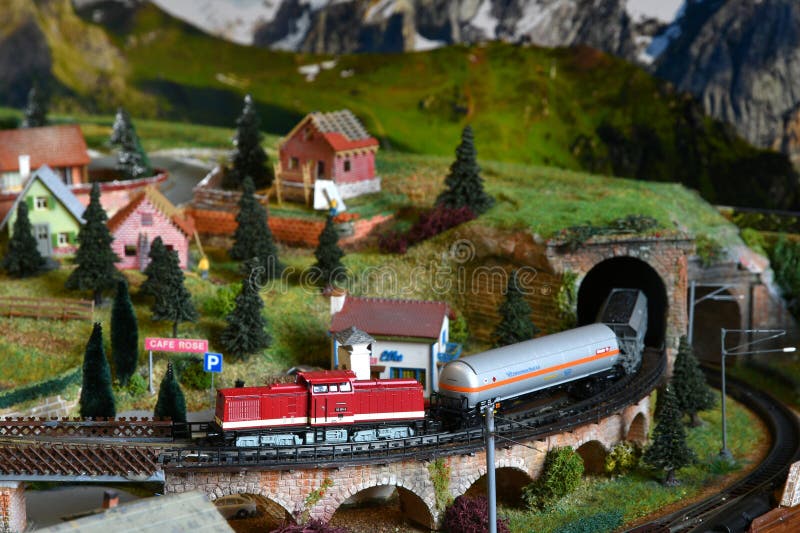 Miniature Railway Model with Model Freight Train that Exit from a ...