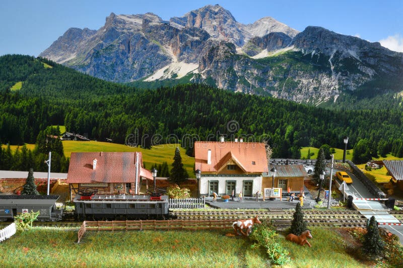 Miniature Railway Model with Model Freight Train on a Mountains ...