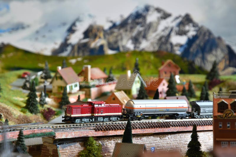 Miniature Railway Model with Model Freight Train on a Mountains ...