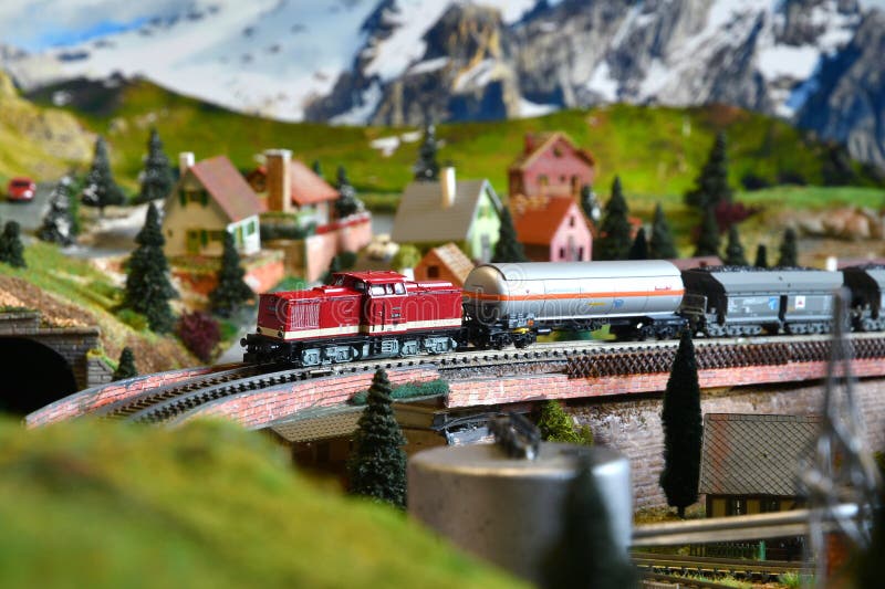 Miniature Railway Model with Model Freight Train on a Mountains ...