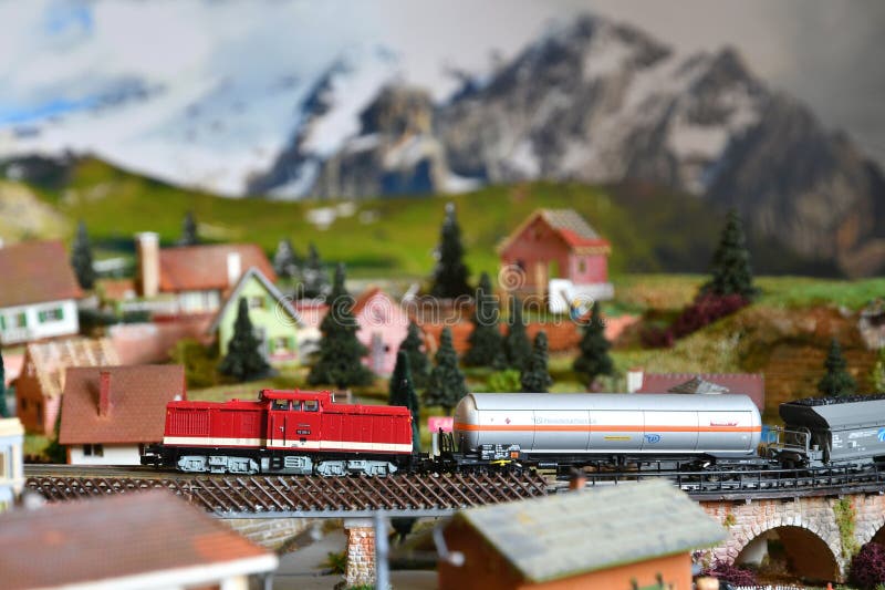 Miniature Railway Model with Model Freight Train on a Mountains ...