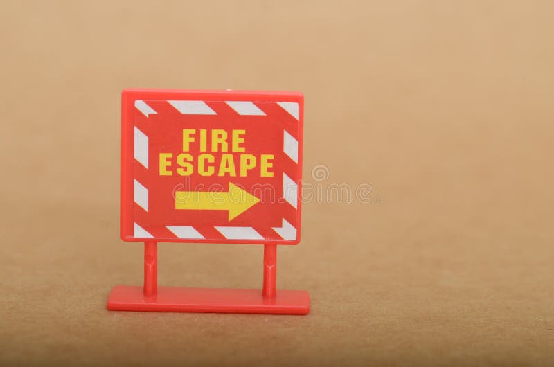 Miniature Red "FIRE ESCAPE" Sign Indicating Emergency Exit Direction ...
