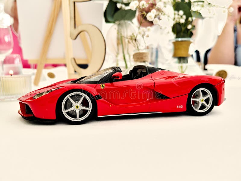 Miniature Red Toy Ferrari Car on a Tabletop Editorial Stock Image ...