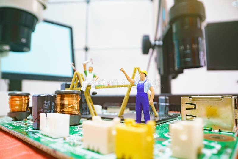 Miniature Repair Man on Mainboard, Miniature Figure of Worker Team Try ...