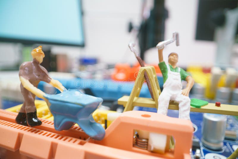Miniature Repair Man on Mainboard, Miniature Figure of Worker Team Try ...