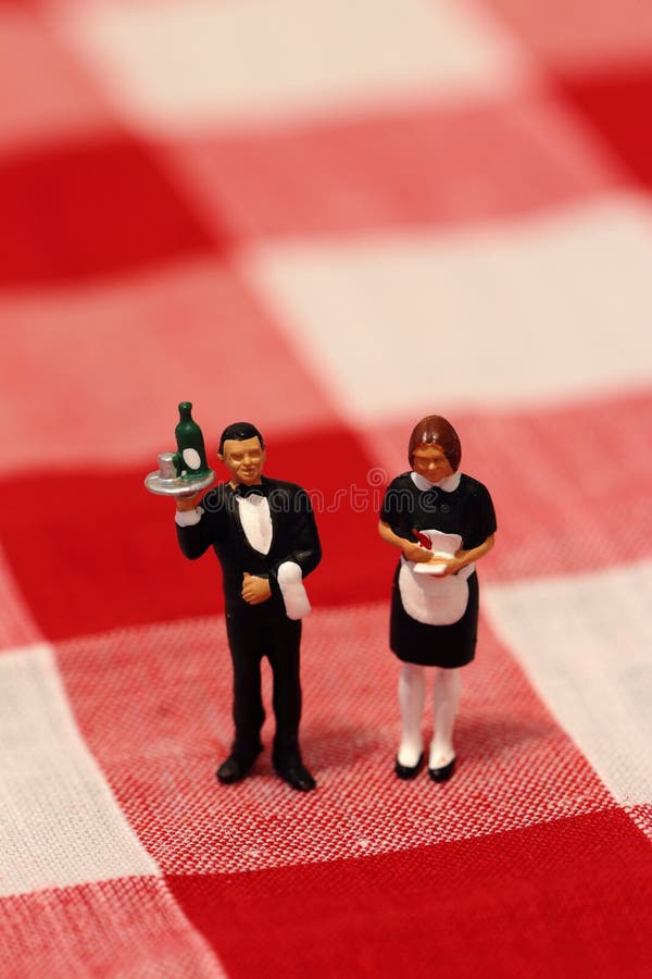 Miniature Scale Model Waiter and Waitress on Gingham Stock Image ...