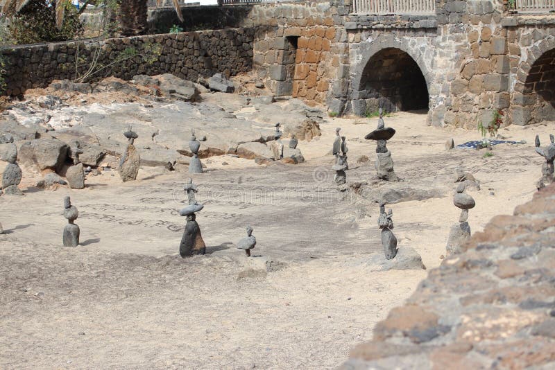 Miniature stone monuments stock photo. Image of flood - 77599292