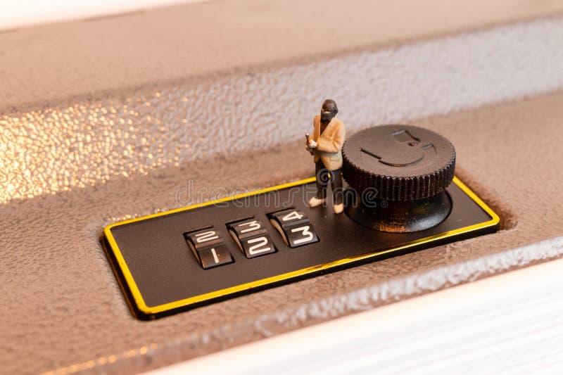 Miniature Thief Cracking Safe Lock Combination Stock Image - Image of ...