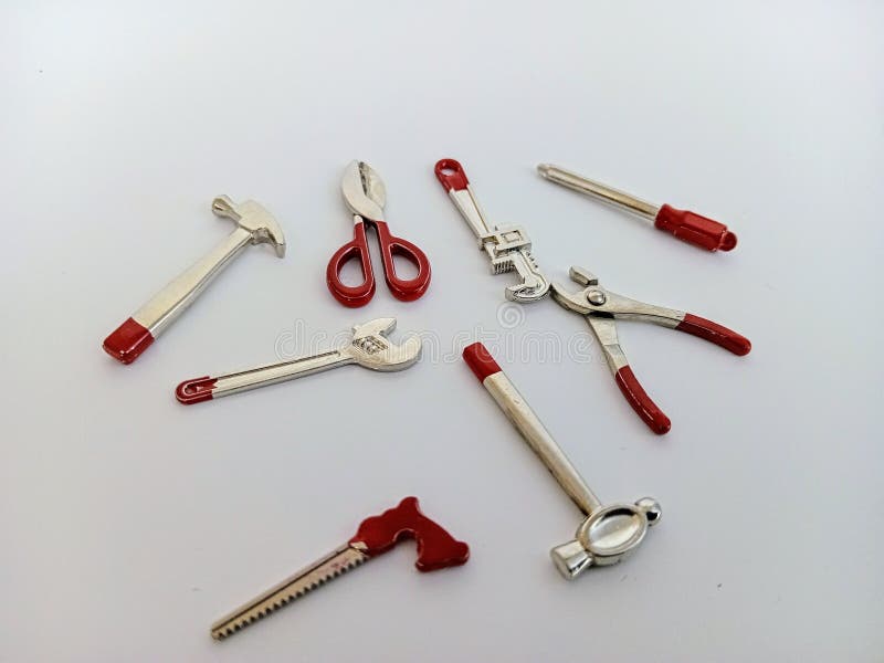 Miniature Tools on a White Background Stock Photo - Image of tiny, iron ...