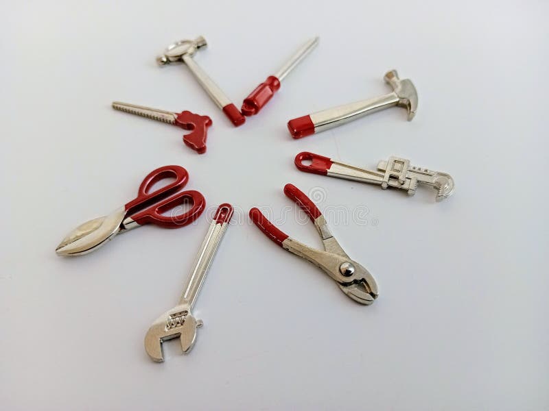Miniature Tools on a White Background Stock Photo - Image of collection ...