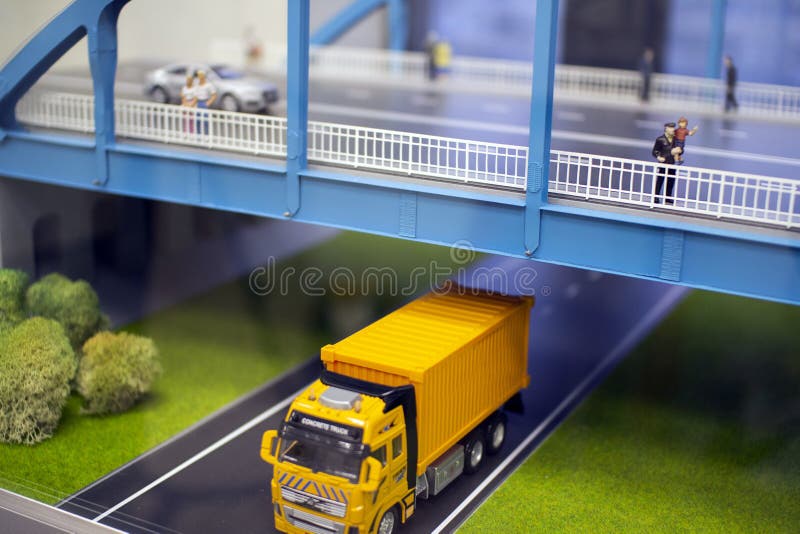 Miniature Toy Cars and People on the Bridge Stock Photo - Image of ...