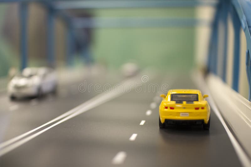 Miniature Toy Cars and People on the Bridge Stock Image - Image of ...