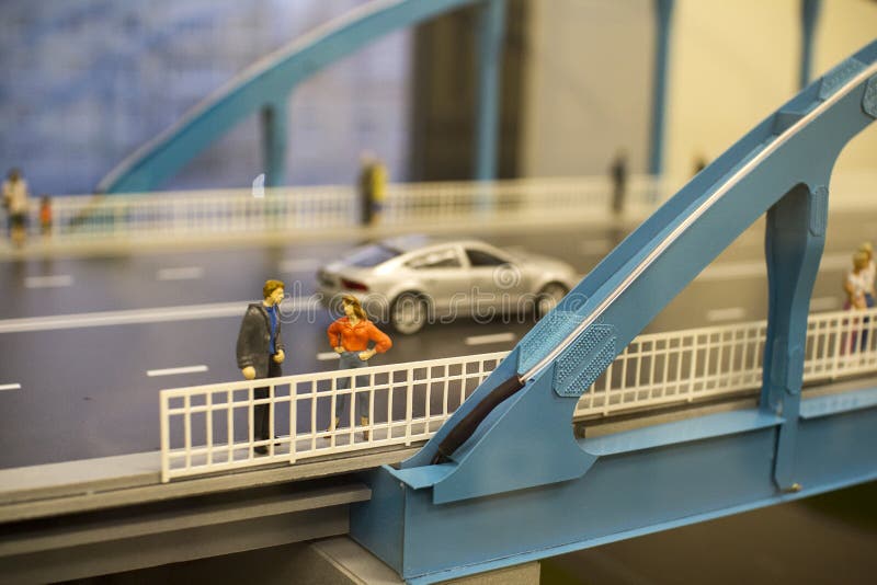 Miniature Toy Cars and People on the Bridge Stock Image - Image of ...