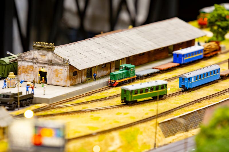 Miniature Train Station Model with Workers Loading Cargo and Passengers ...