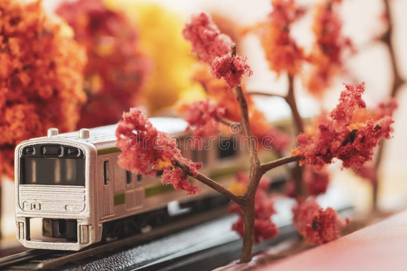 Miniature Train Toy at a Train Platform in Autumn or Fall Season ...