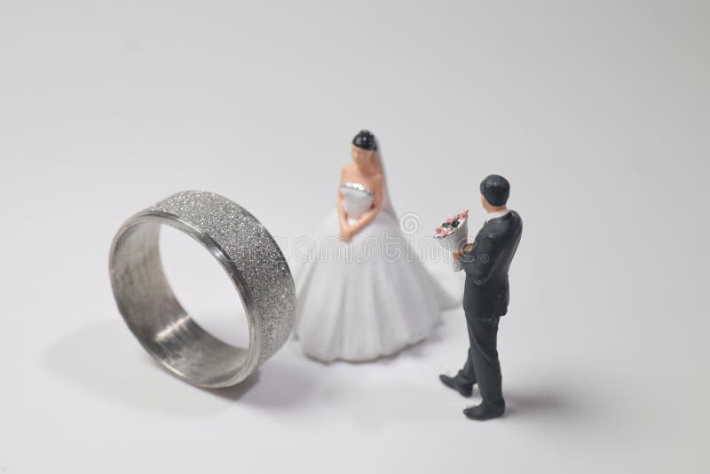 A Miniature Wedding Concept, Bride and Groom Greeting Stock Photo ...