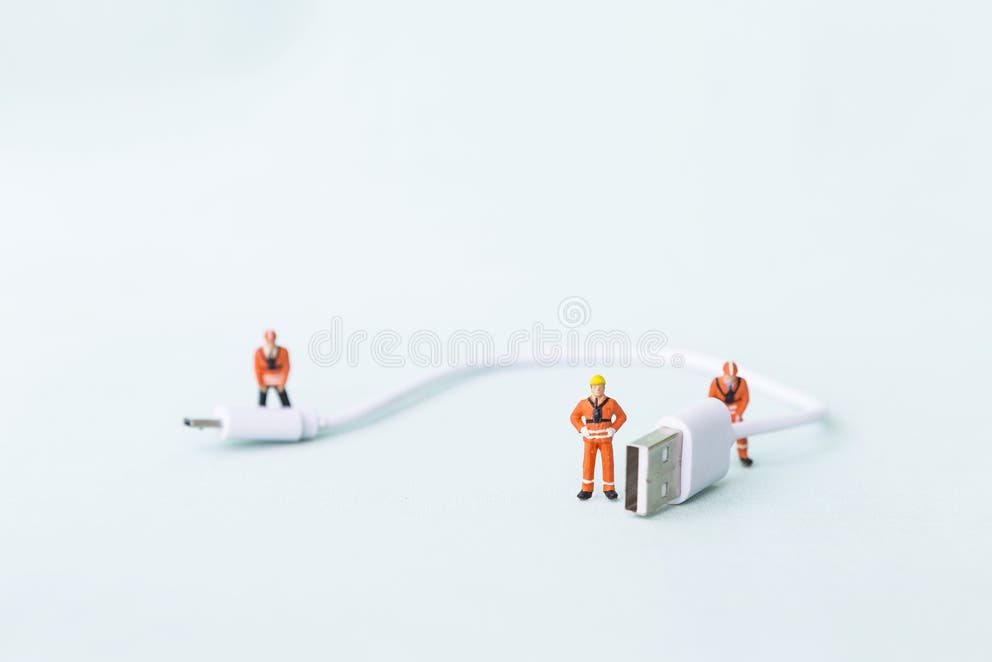 Miniature Worker with USB Cable, Technology Industry Concept Stock ...