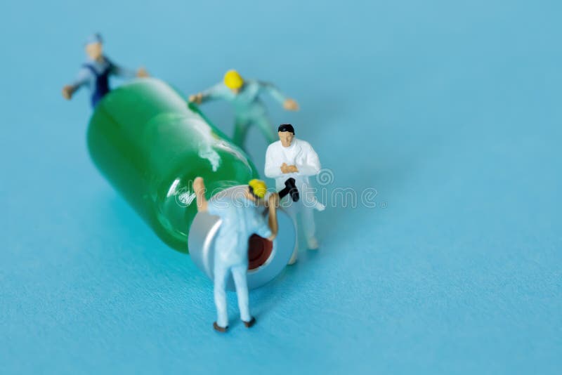 Miniature Workers Cleaning a Broken Hard Drive and Recycle it Stock ...