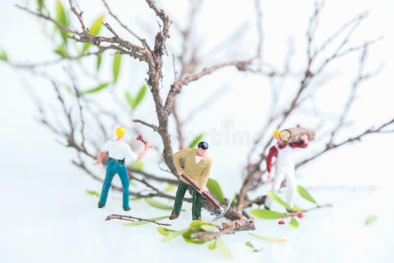 Miniature Workmen Working Together in Felling and Cutting Trees Close ...