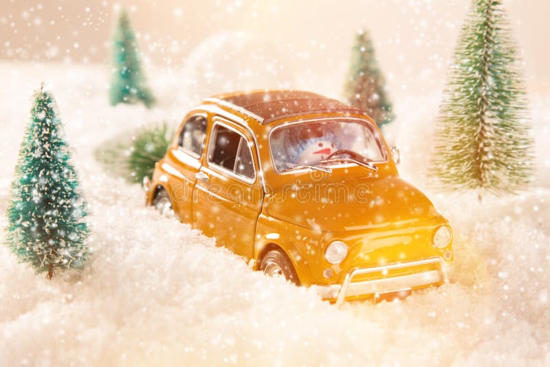 Miniature Yellow Car with Spruce Trees Stock Photo - Image of miniature ...