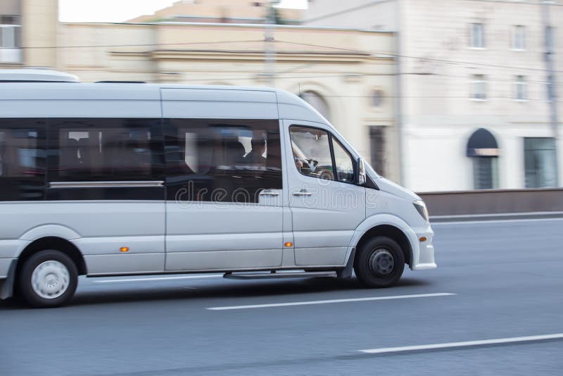 White Minibus Driving Along a Dirt Road Editorial Stock Photo - Image ...