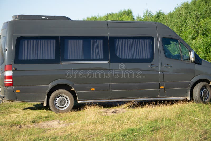 Minibus in Motion on a Background of Mountains Stock Photo - Image of ...