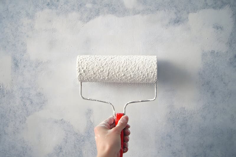 Minimal Decor: a Close-Up of Paint Application with a Roller Stock ...