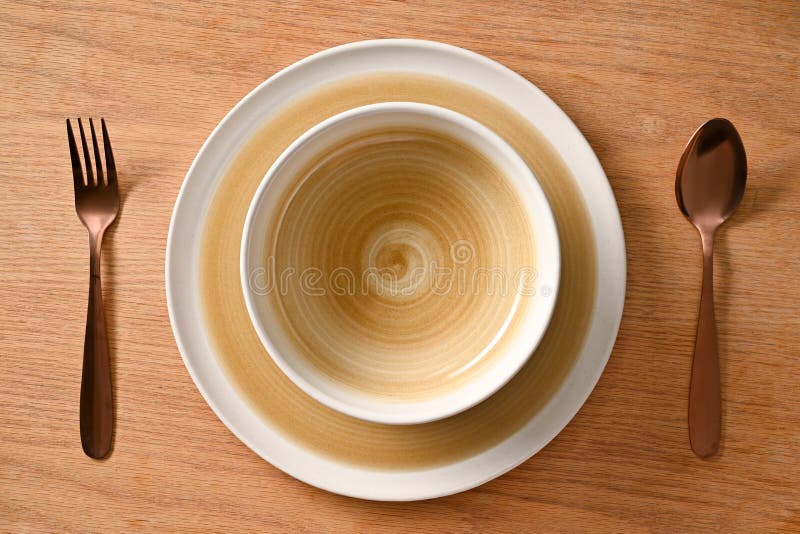 Minimal Dining Table Setting Top View with Plate, Bowl and Silverware ...