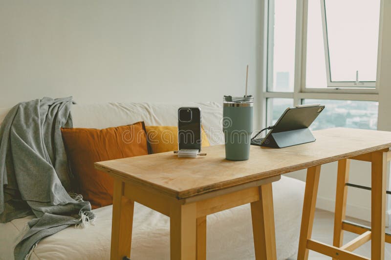 Minimal and Loft Living Room Design with Iced-coffee and Computer in ...