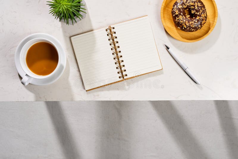 Minimal Styled Flat Lay Table with Open Notebook, Donut and Tea. Stock ...