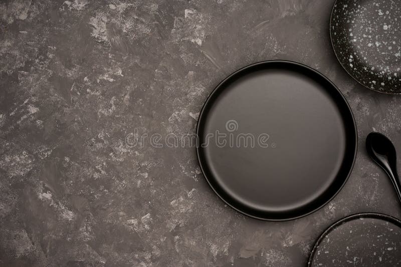 Minimal Stylish Dining Table with Empty Black Ceramic Plates and Copy ...
