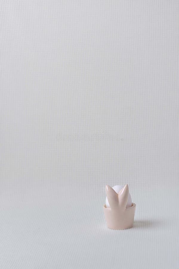 Minimalist Aesthetic Easter Holiday Background with Egg Stand and an ...