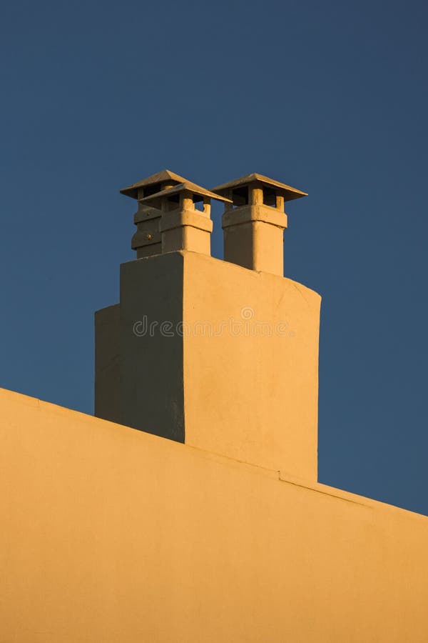 Minimalist Architectural Chimneys Stock Photo - Image of blue, building ...