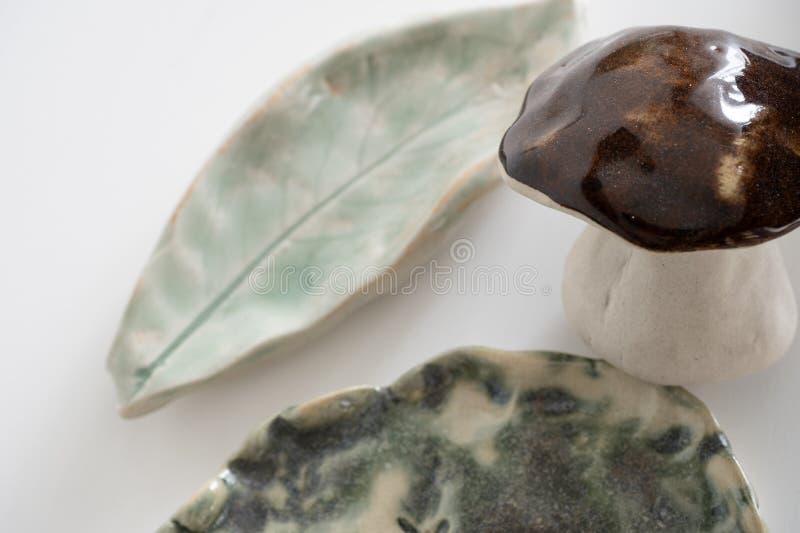 A Minimalist Arrangement of Handcrafted Ceramic Objects Displayed on a ...