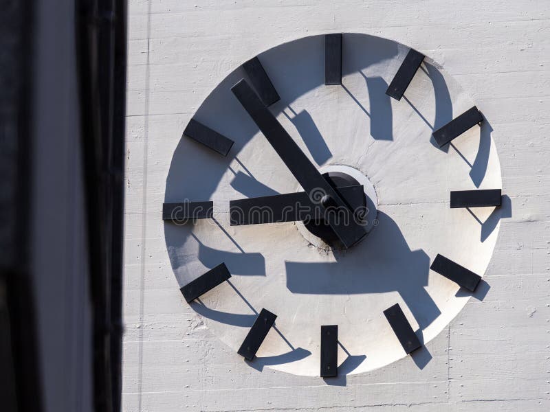 Minimalist Clock on White Wall Stock Image - Image of timepiece, shadow ...