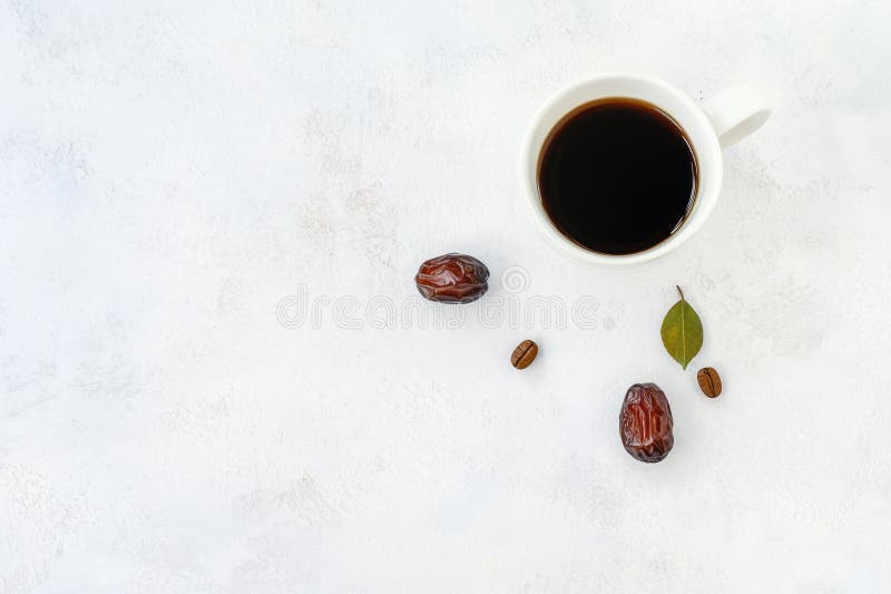 Minimalist Composition: Coffee Cup, Dates, and Coffee Beans on White ...