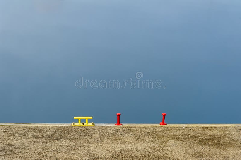 A Minimalist Composition Featuring Vibrant Yellow and Red Objects ...