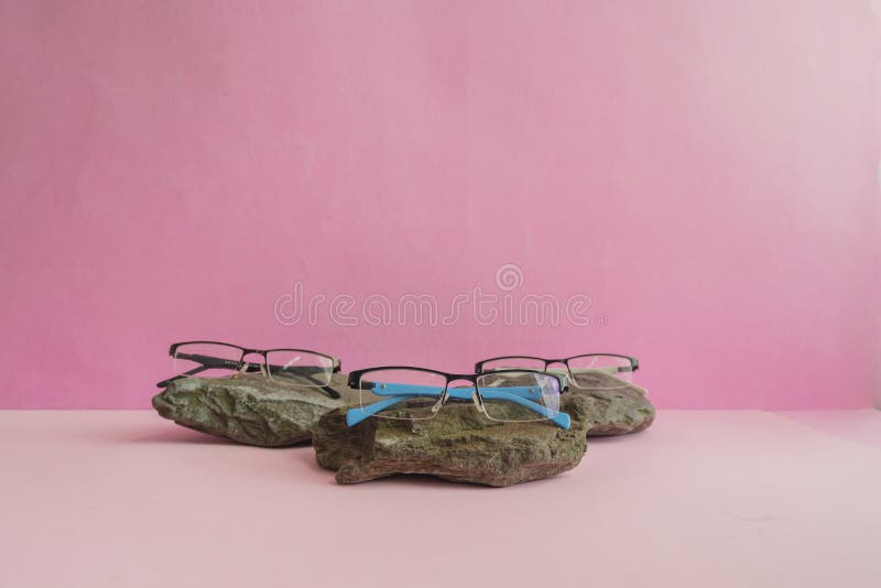 Minimalist Concept Idea. Half Frame Square Glasses on Stone on Pink ...