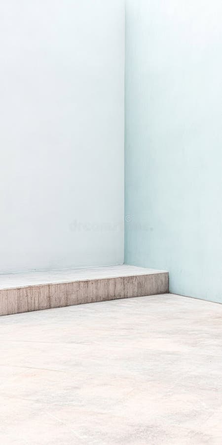 Minimalist Corner with Light Blue Walls and Concrete Step in a Serene ...